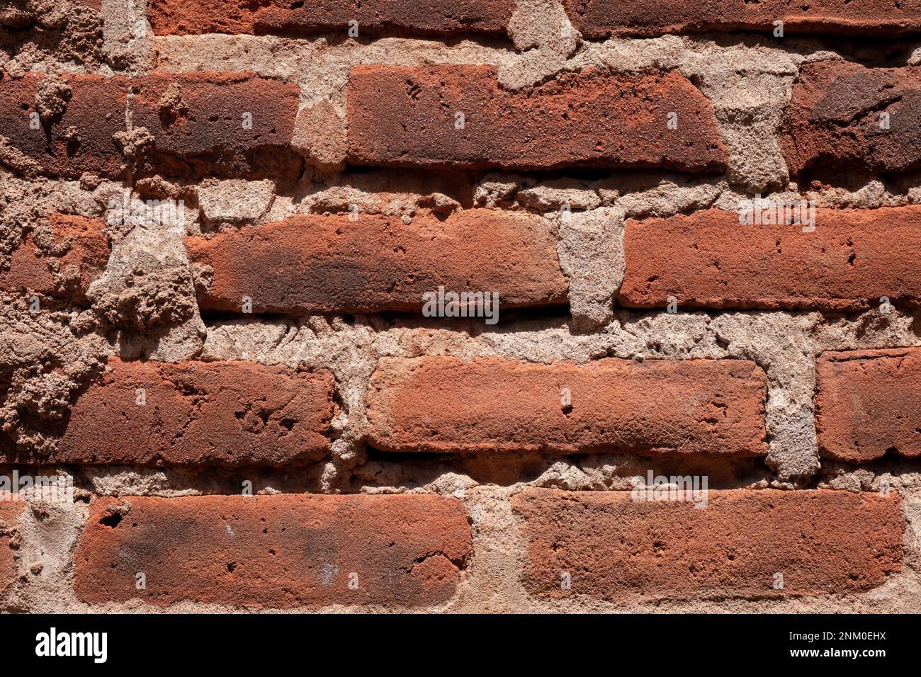 Red brick wall. Concept of lost freedom Stock Photo - Alamy