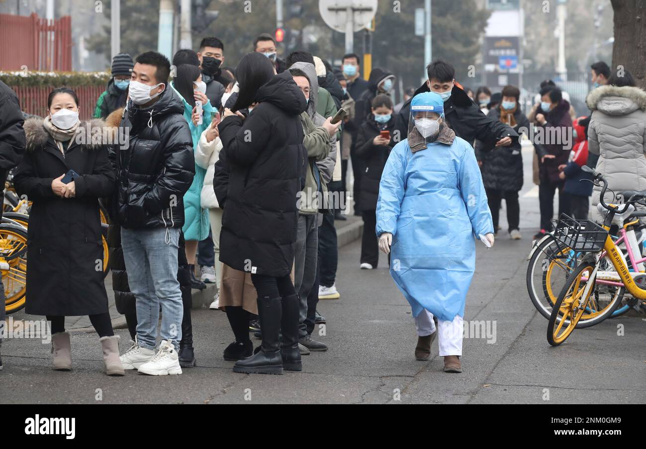 People line up to take PCR test in Beijing, China on Jan. 24, 2022. A ...