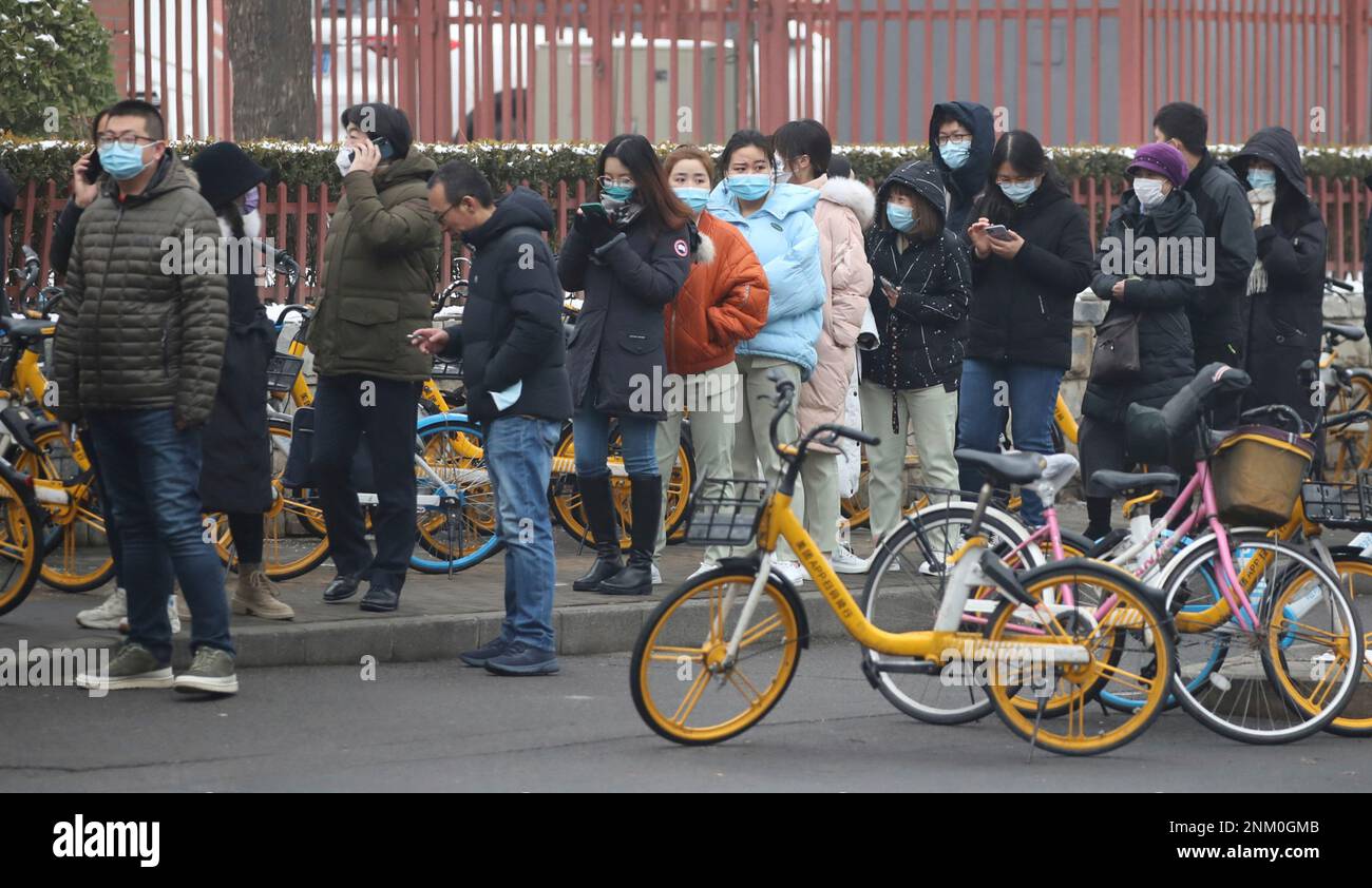 People line up to take PCR test in Beijing, China on Jan. 24, 2022. A ...