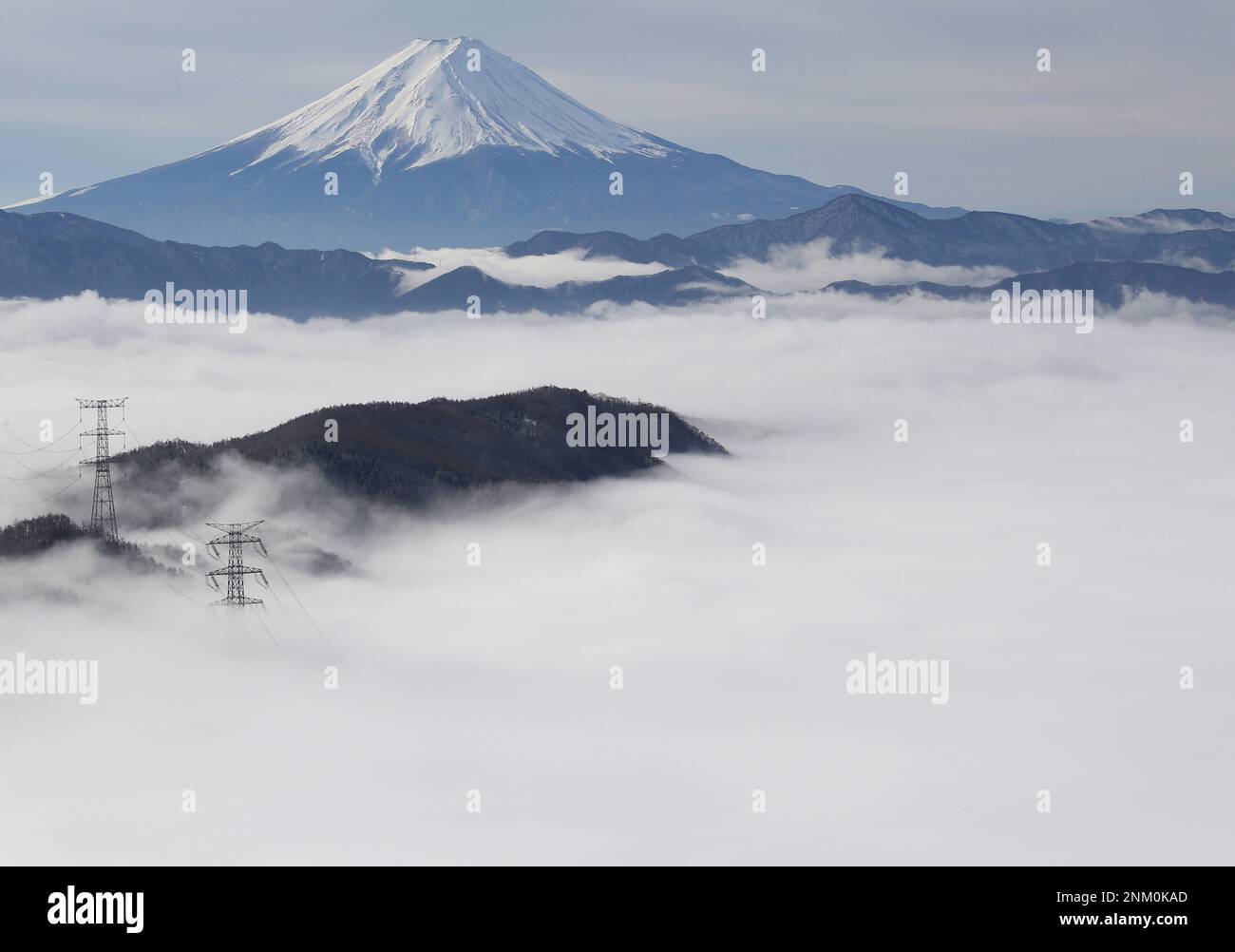 An aerial photo shows Kofu Basin covered with a sea of clouds with ...