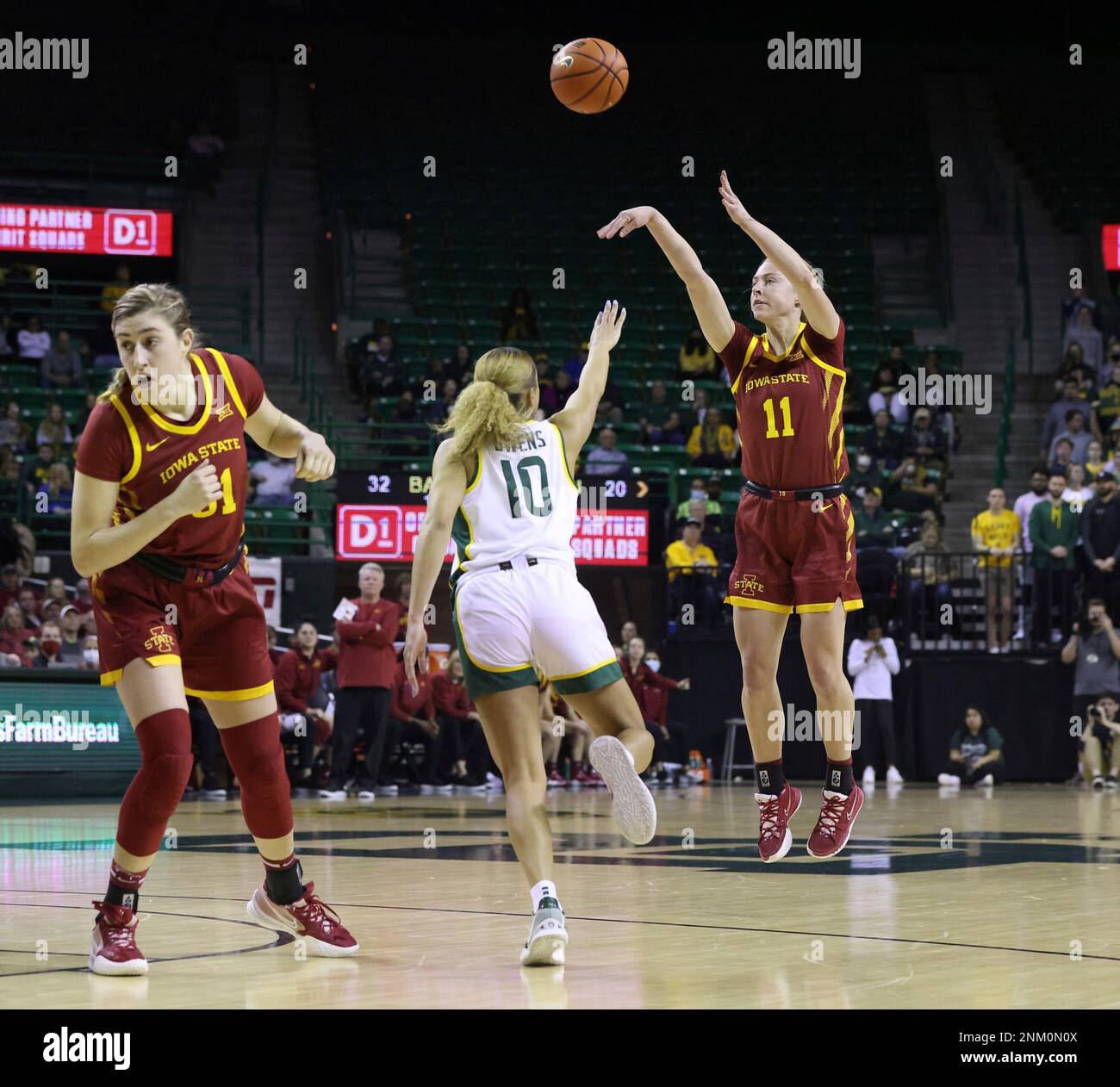 Iowa State guard Emily Ryan puts up a three point shot over Baylor ...