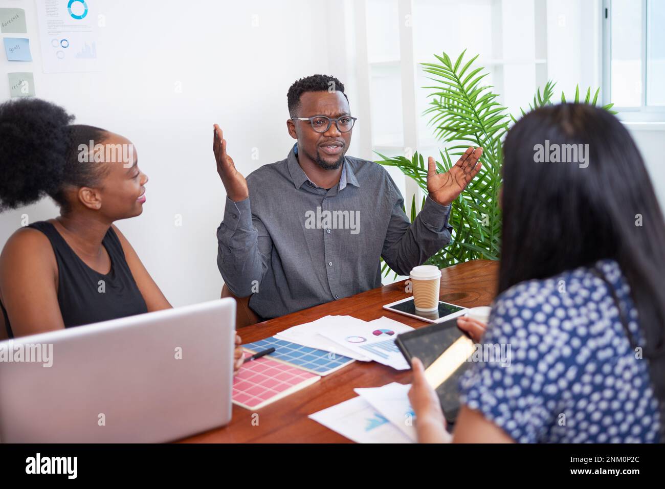 Team of diverse colleagues have heated discussion debate, boardroom ...