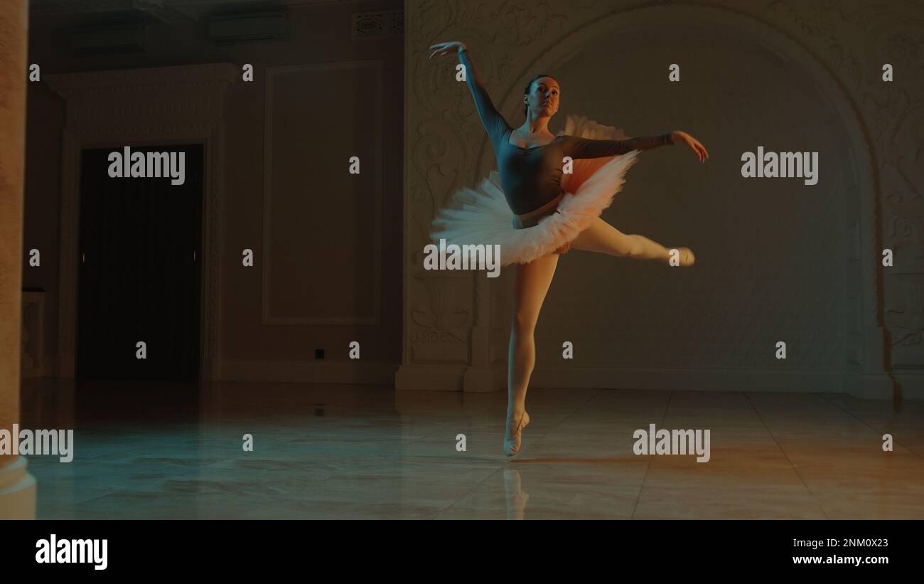 Cinematic shot of graceful female ballet dancer on choreography ...