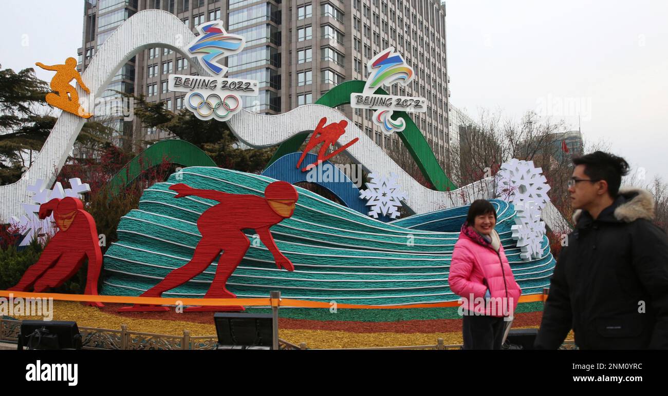 The Beijing Winter Olympic and Paralympic emblems are seen at a main ...