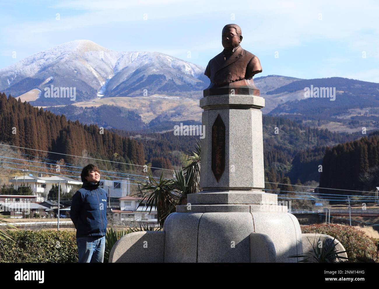 A statue of Kitasato Shibasaburō is pictured with Mt. Waita seen in the ...