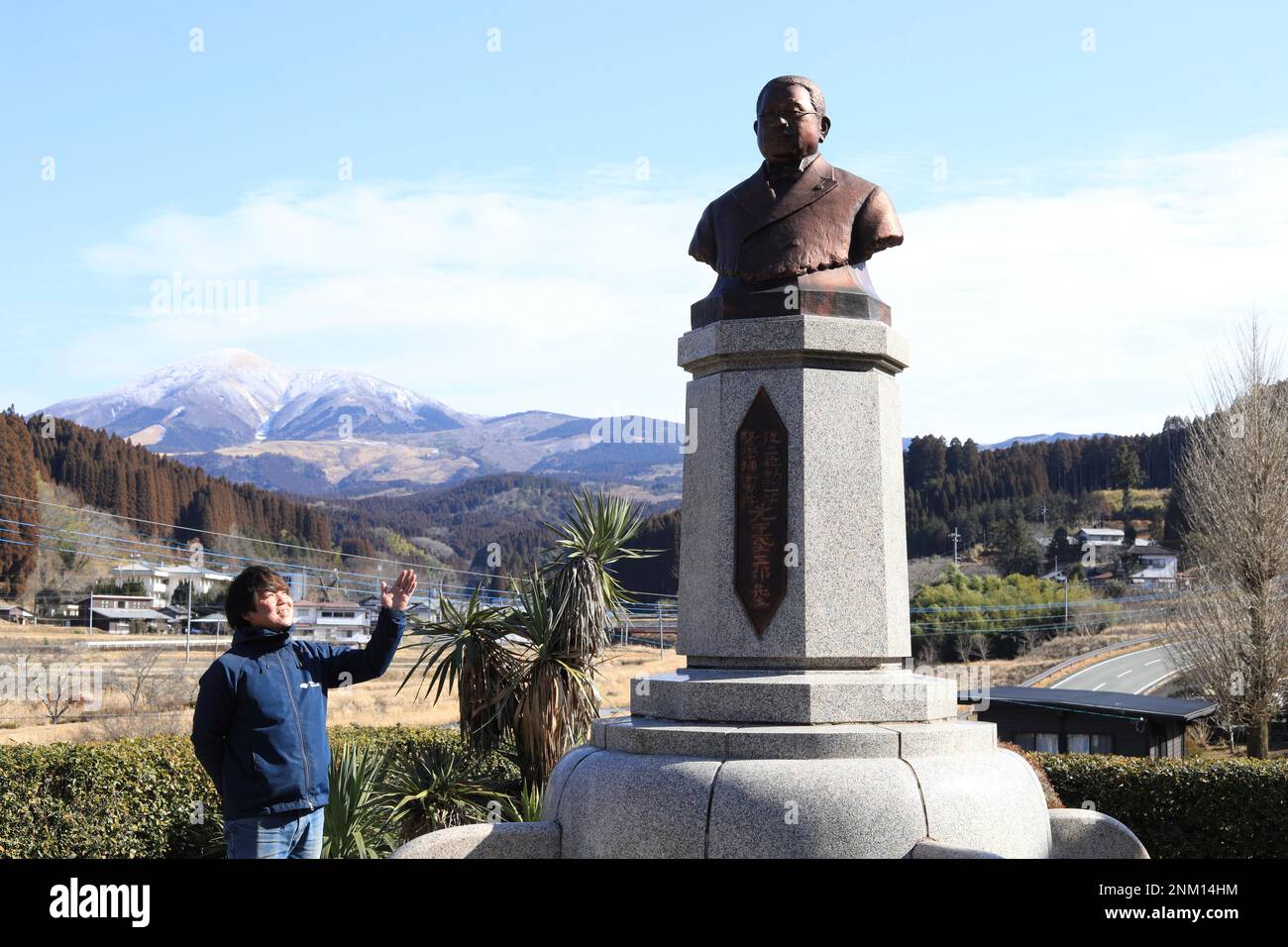 A statue of Kitasato Shibasaburō is pictured with Mt. Waita seen in the ...