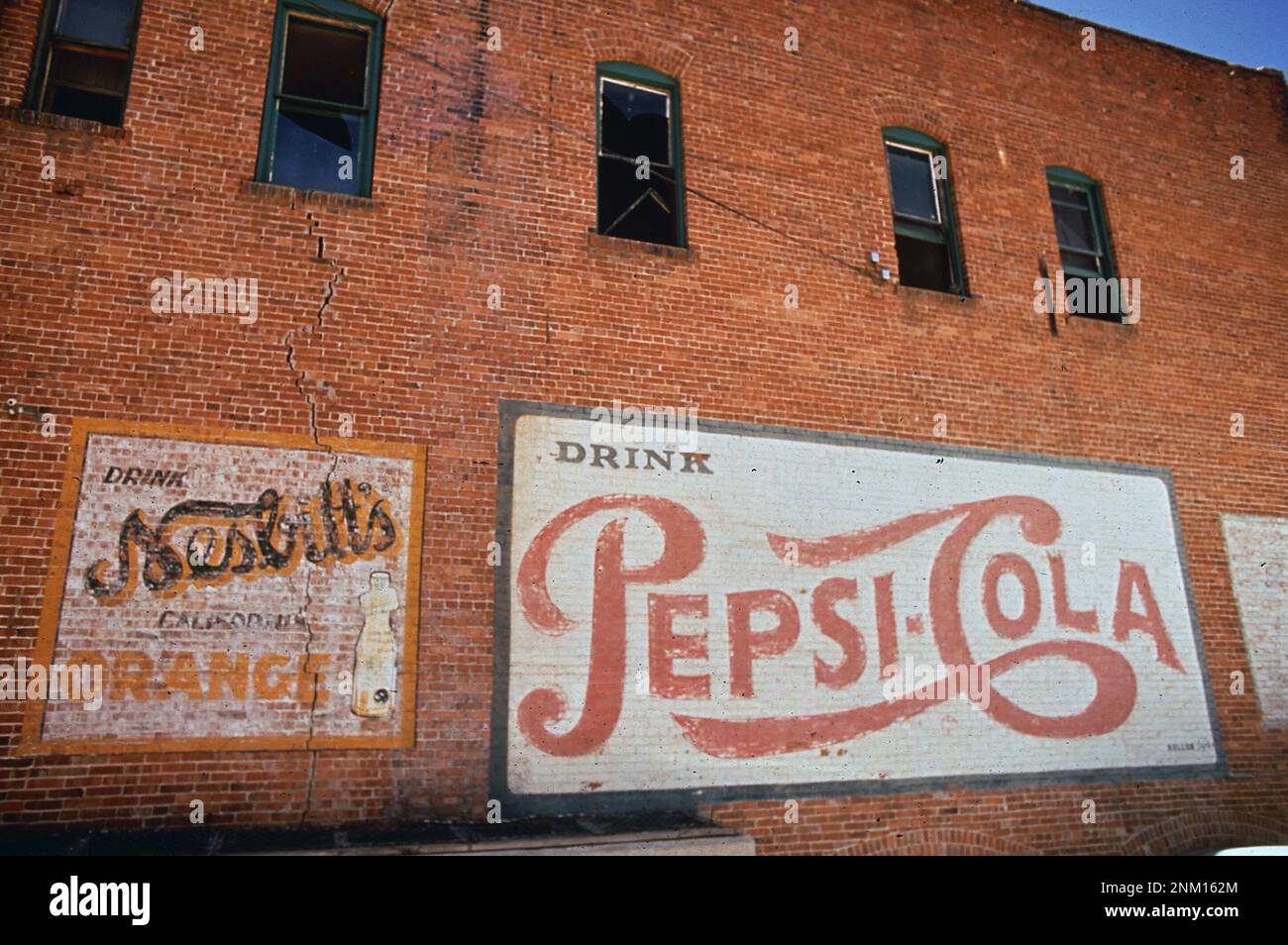 1970s America: Ubiquitous advertising signs, Pepsi-Cola sign, in an old ...