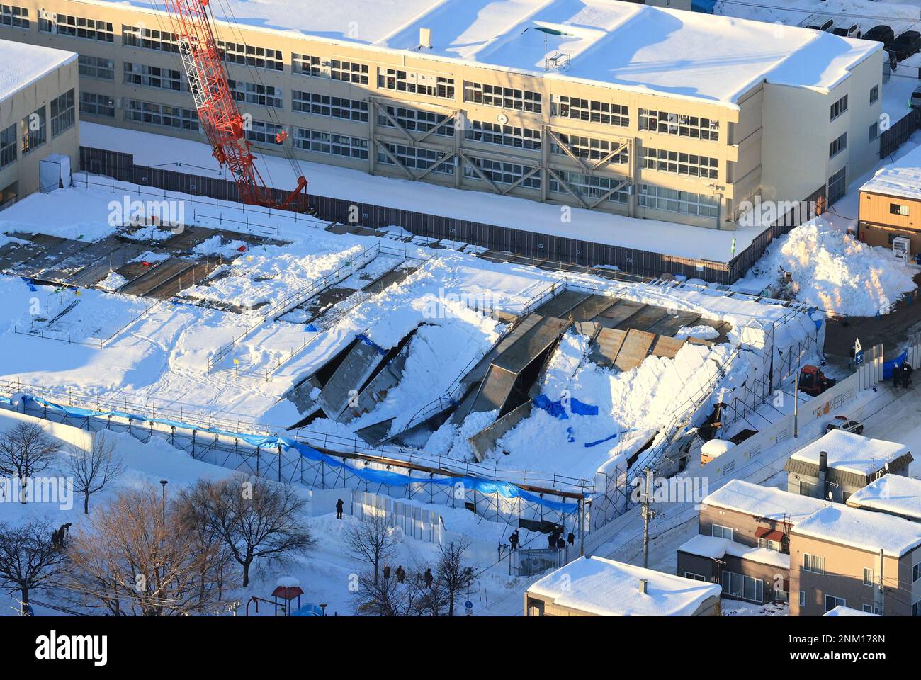 An aerial photo taken from a charted helicopter shows a roof of Higashiyama Municipal Elementary ...