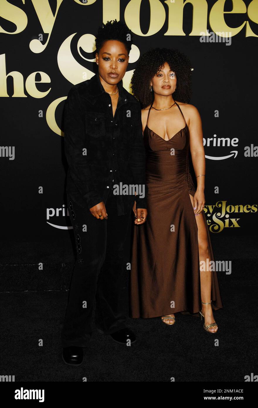 HOLLYWOOD, CALIFORNIA - FEBRUARY 23: (L-R) Ayesha Harris and guest attend the Los Angeles ...