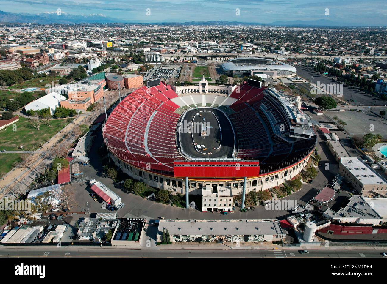 An aerial view of the construction of a temporary asphalt racetrack at the Los Angeles Memorial ...