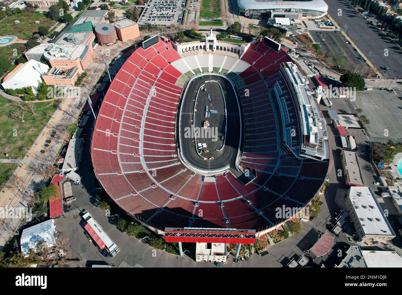 An aerial view of the construction of a temporary asphalt racetrack at the Los Angeles Memorial ...