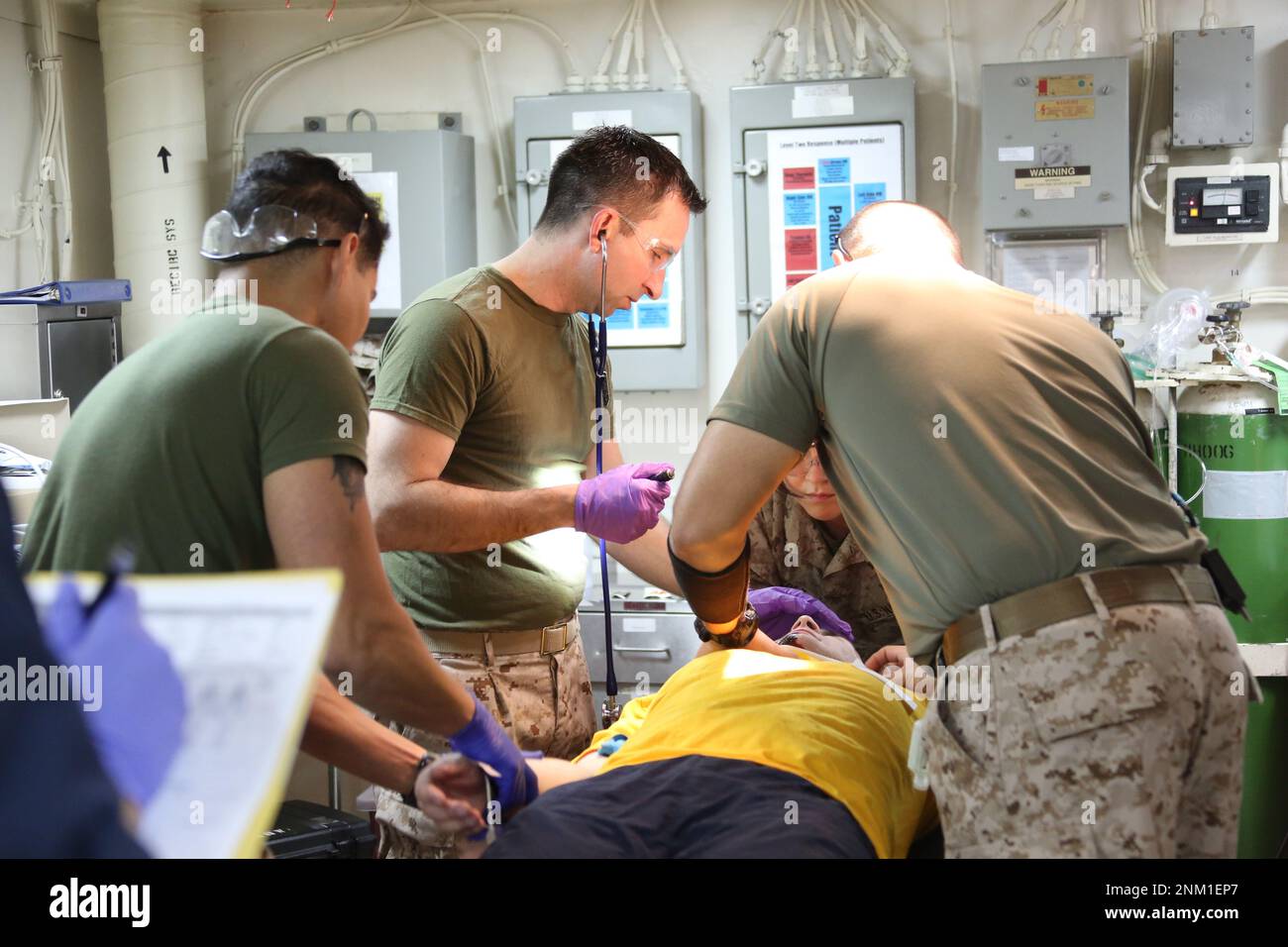 A Navy surgeon assigned to the 26th Marine Expeditionary Unit (MEU ...