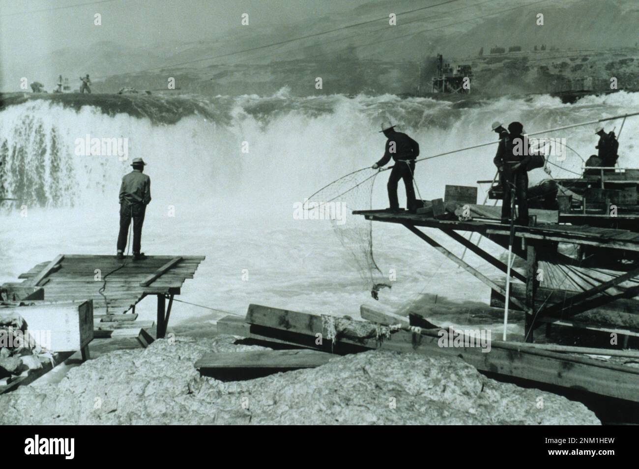 Salmon fishing with large loop nets by Native Americans. Tribal ...