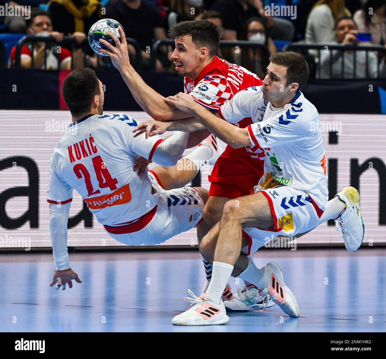 Lazar Kukic, left, and Mladen Sotic, right, of Serbia in action against ...