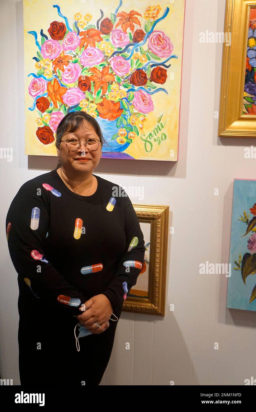 This Jan. 7, 2022, photo shows Dr. Sami Ali's posing in front of some ...