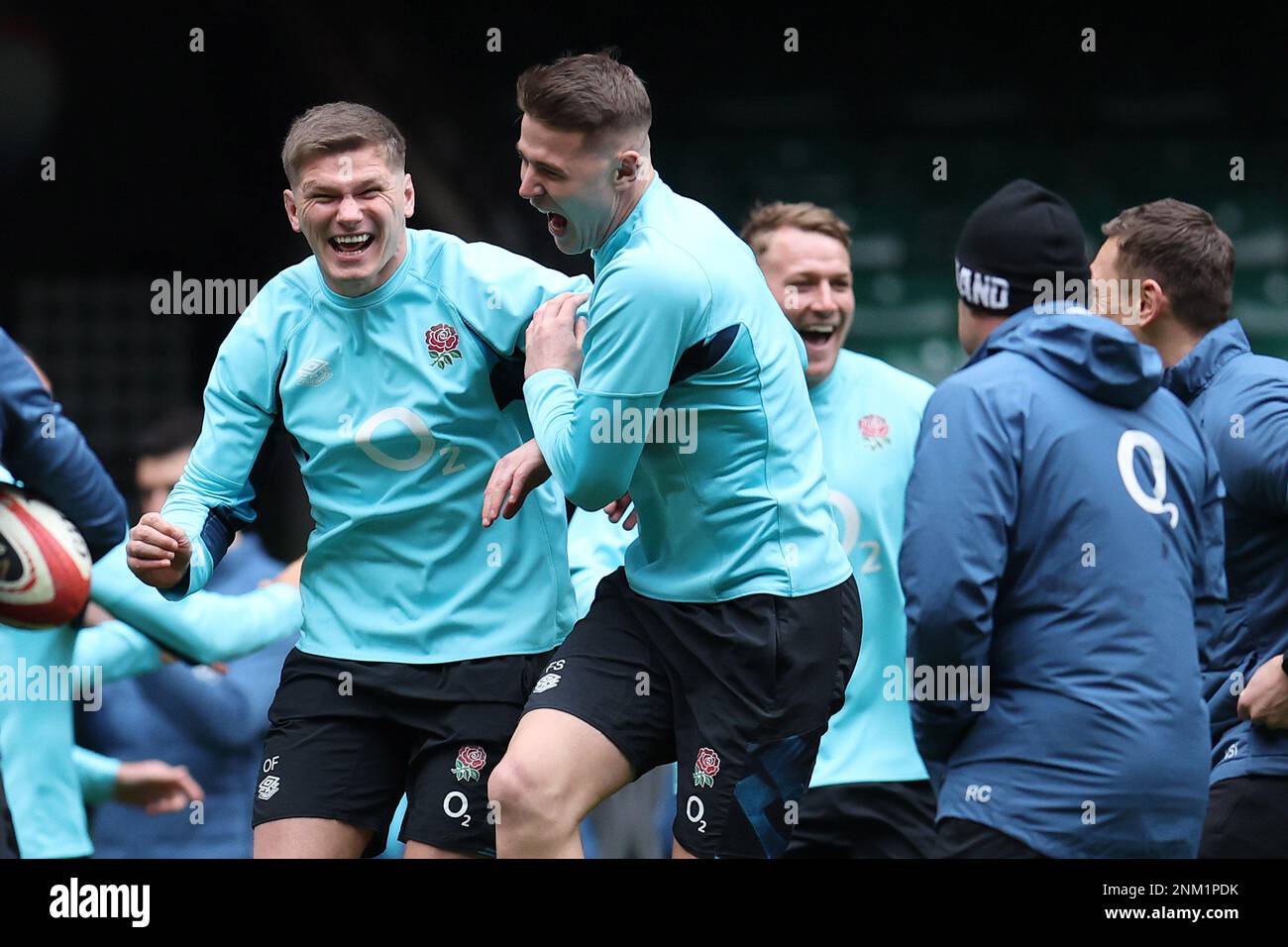 Cardiff, UK. 24th Feb, 2023. Owen Farrell of England (l) jokes with ...