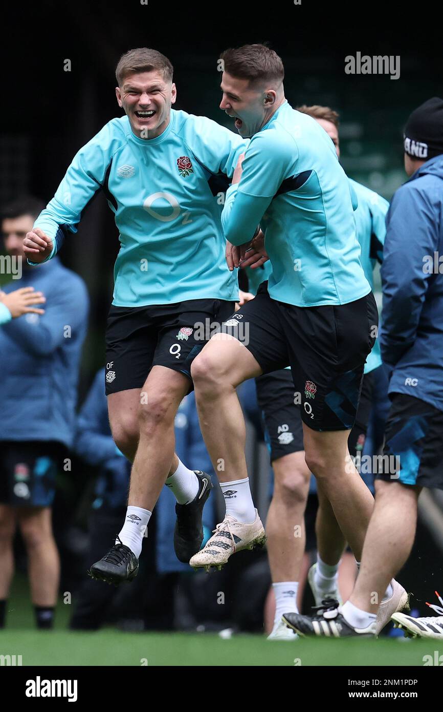 Cardiff, UK. 24th Feb, 2023. Owen Farrell of England (l) jokes with ...