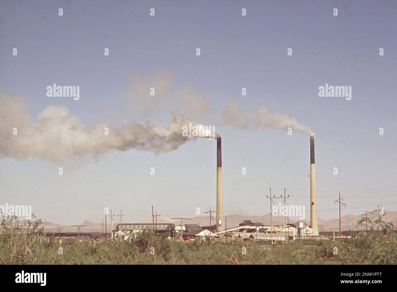1970s America: Phelps Dodge Corp. Pollution spewing from a smelter ca ...