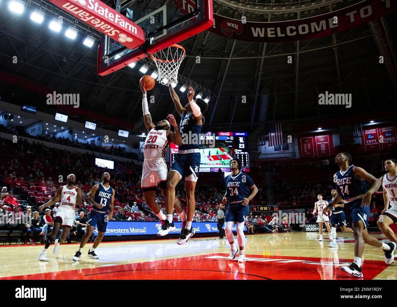 Western Kentucky guard Dayvion McKnight shoots a layup as Rice forward ...