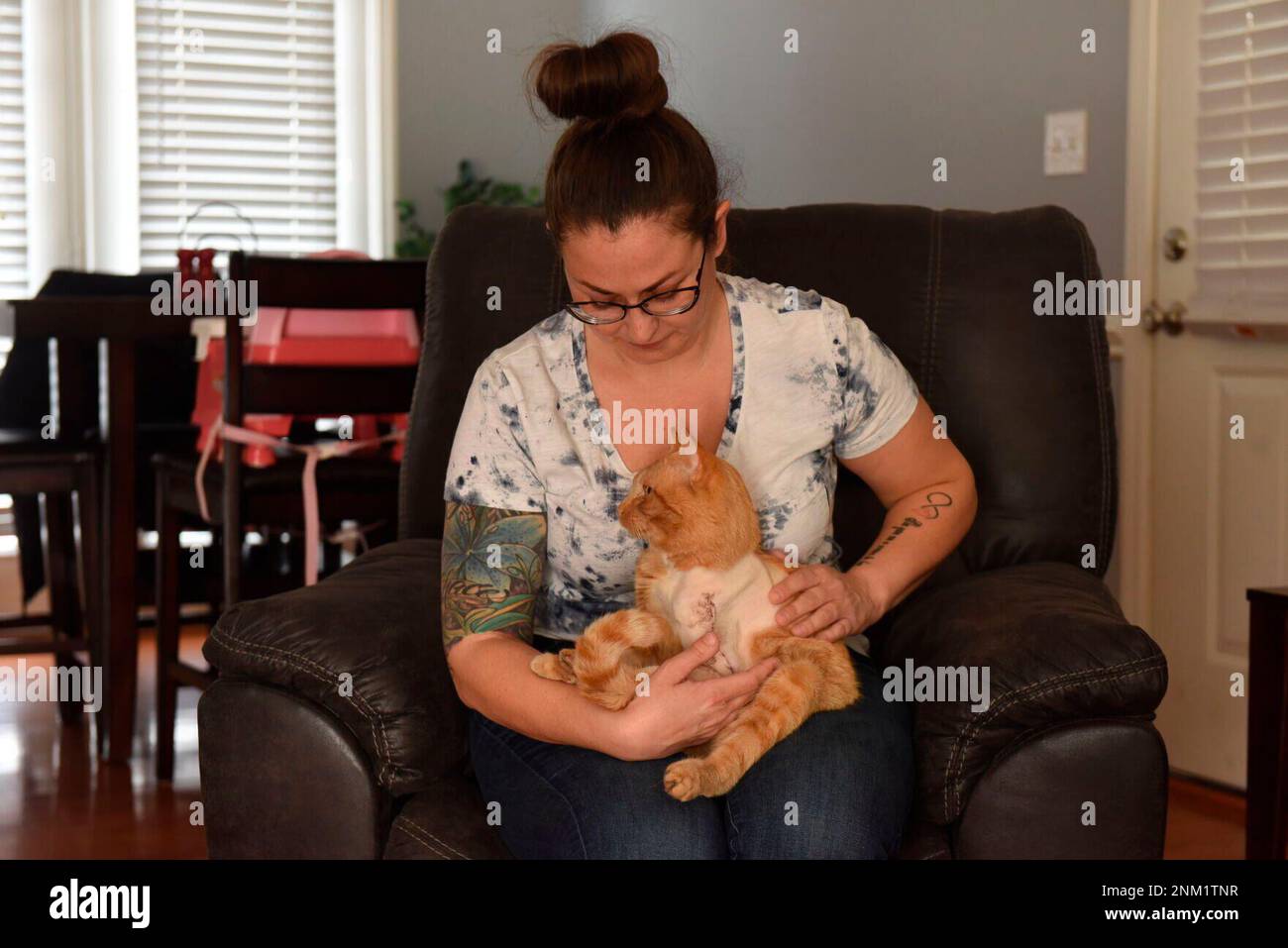 Fallon Phillips holds Apollo after the 1-year-old cat received much ...