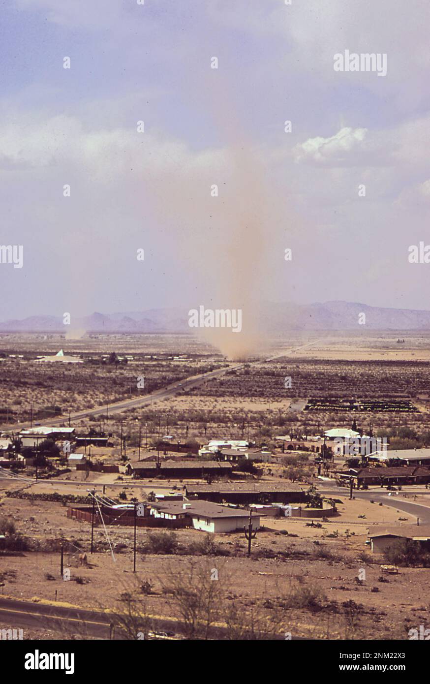 1970s America: Paradise Valley with "dust devils." In the background is ...