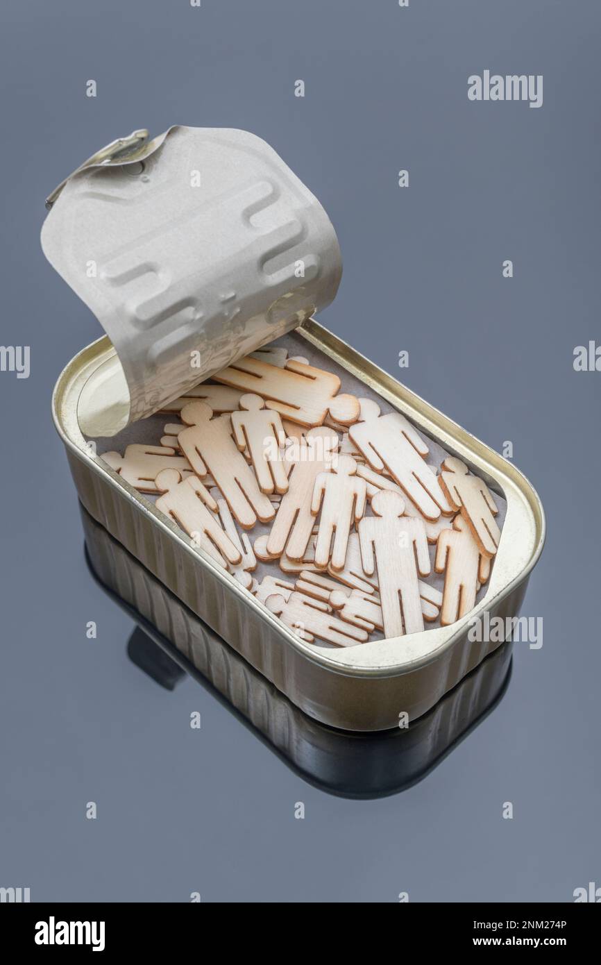 Male laser-cut wooden figures squashed into a sardine tin. Possibly for ...