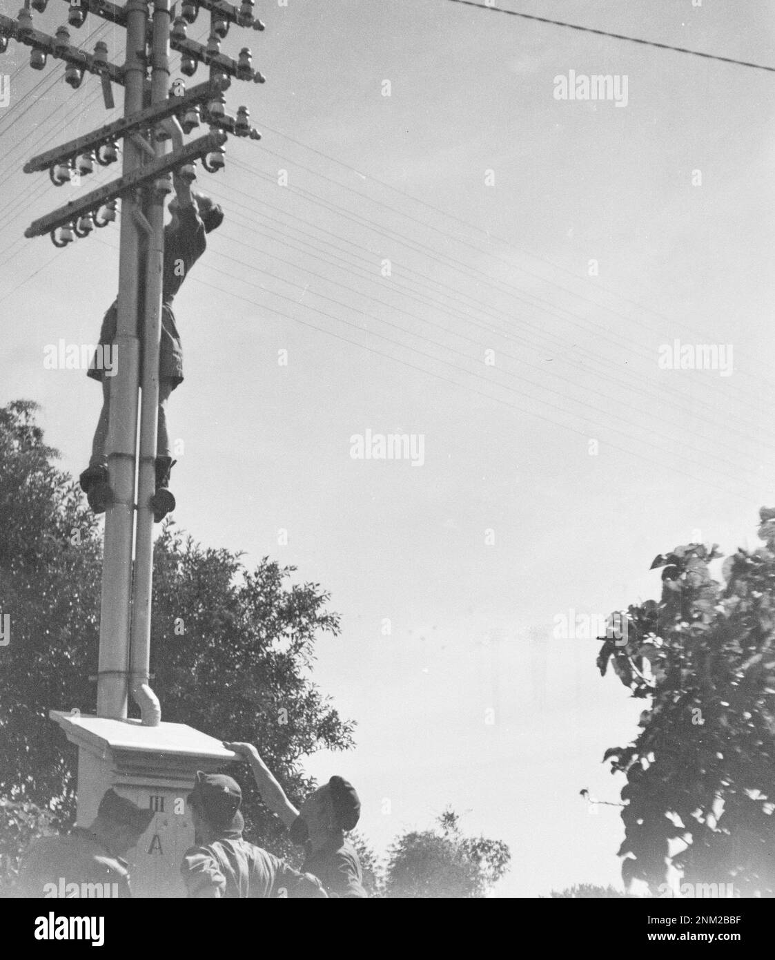 Telephone pole workers Black and White Stock Photos & Images - Alamy