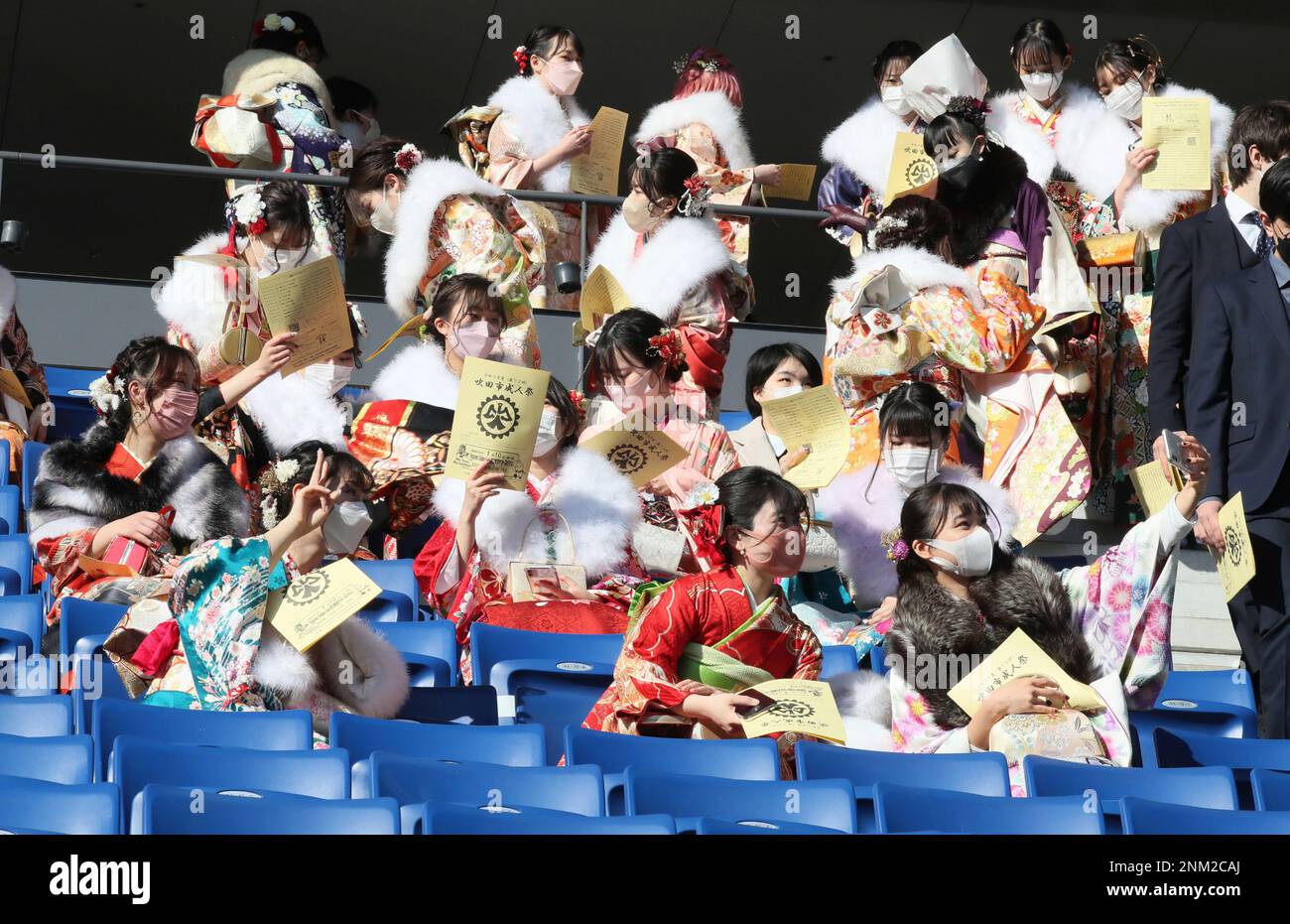 New adults wearing masks attend Seijin-shiki (coming-of-age ceremony ...
