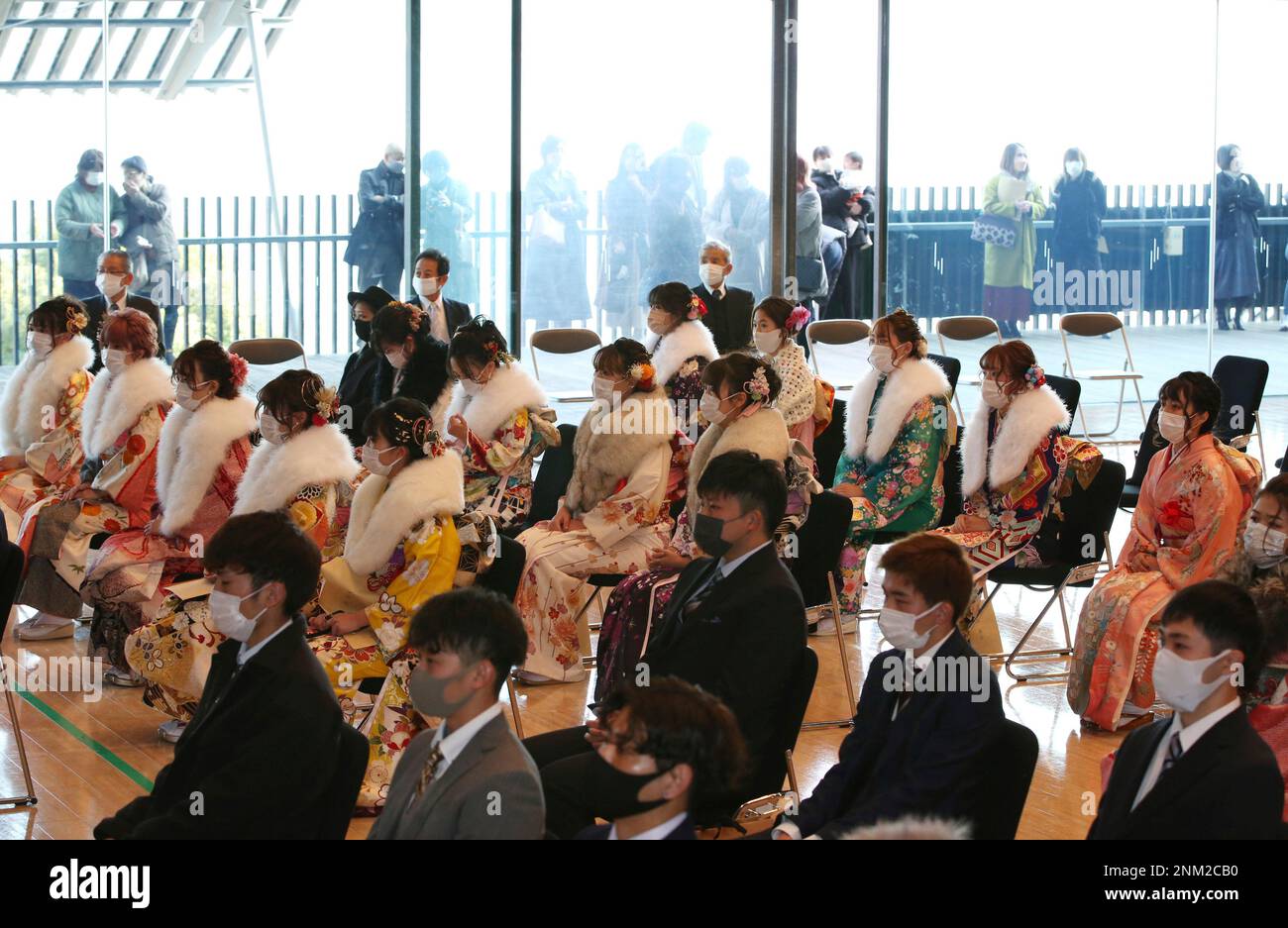 New adults wearing masks attend Seijin-shiki (coming-of-age ceremony ...