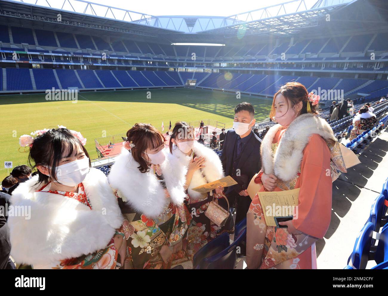 New adults wearing masks attend Seijin-shiki (coming-of-age ceremony ...