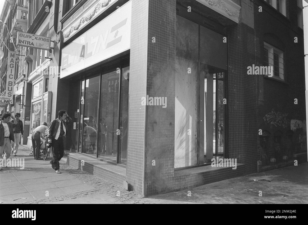 Passersby look at explosion damage at ELAL on Rokin ca. 1985 Stock ...