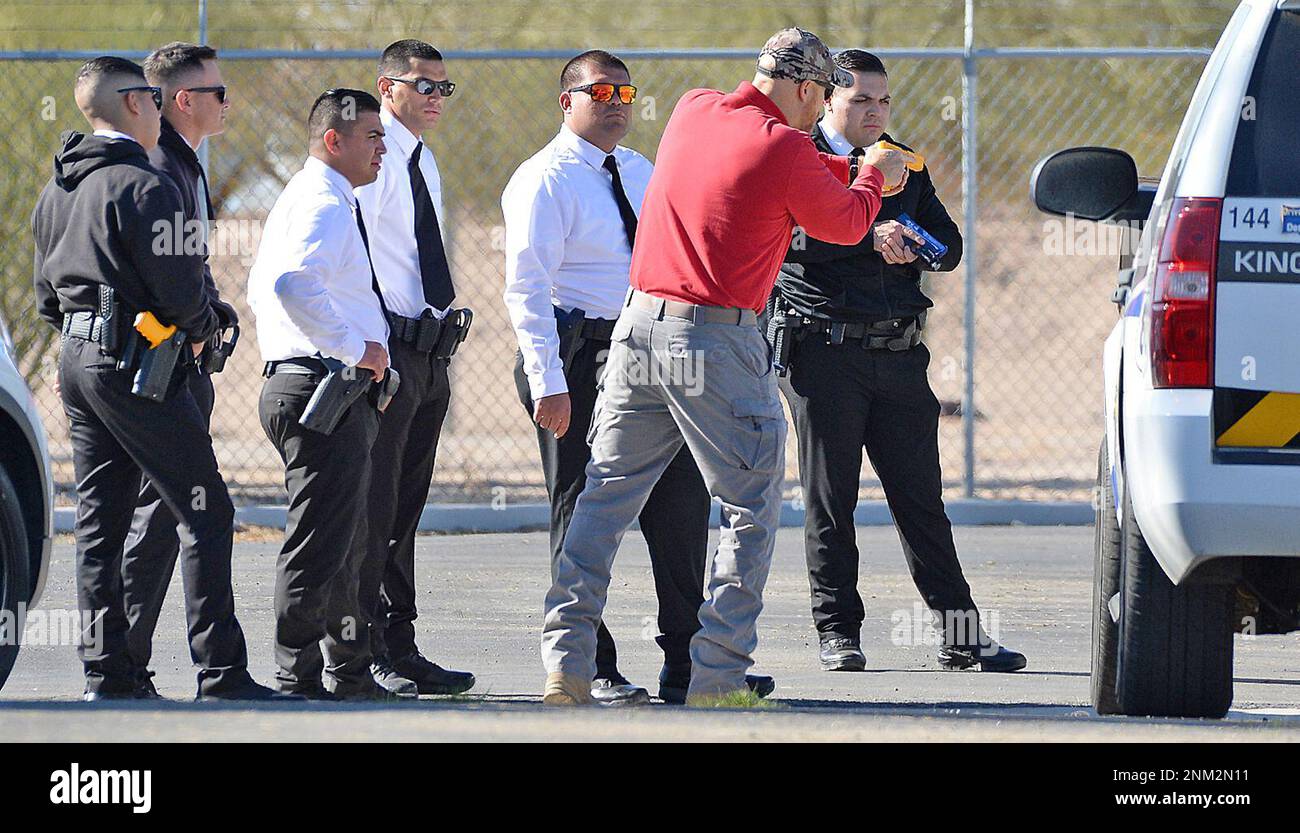 Instructor Daniel Freeman (second from right), a Yuma Police Department ...