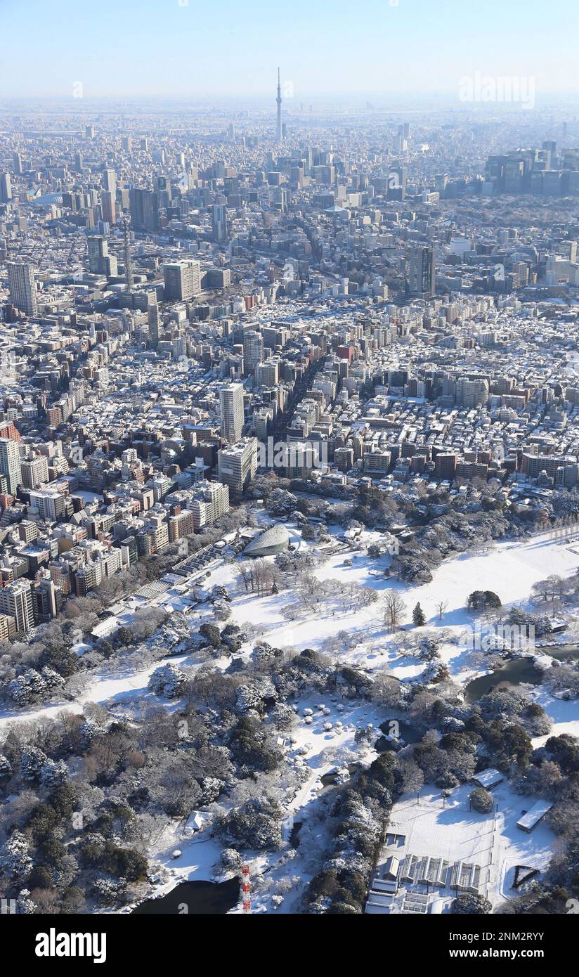 An aerial photo shows Shinjuku Gyoen National Garden and buildings ...