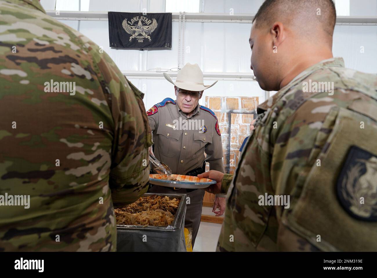 Texas DPS Executive Director Steve McCraw serves food to Texas State ...