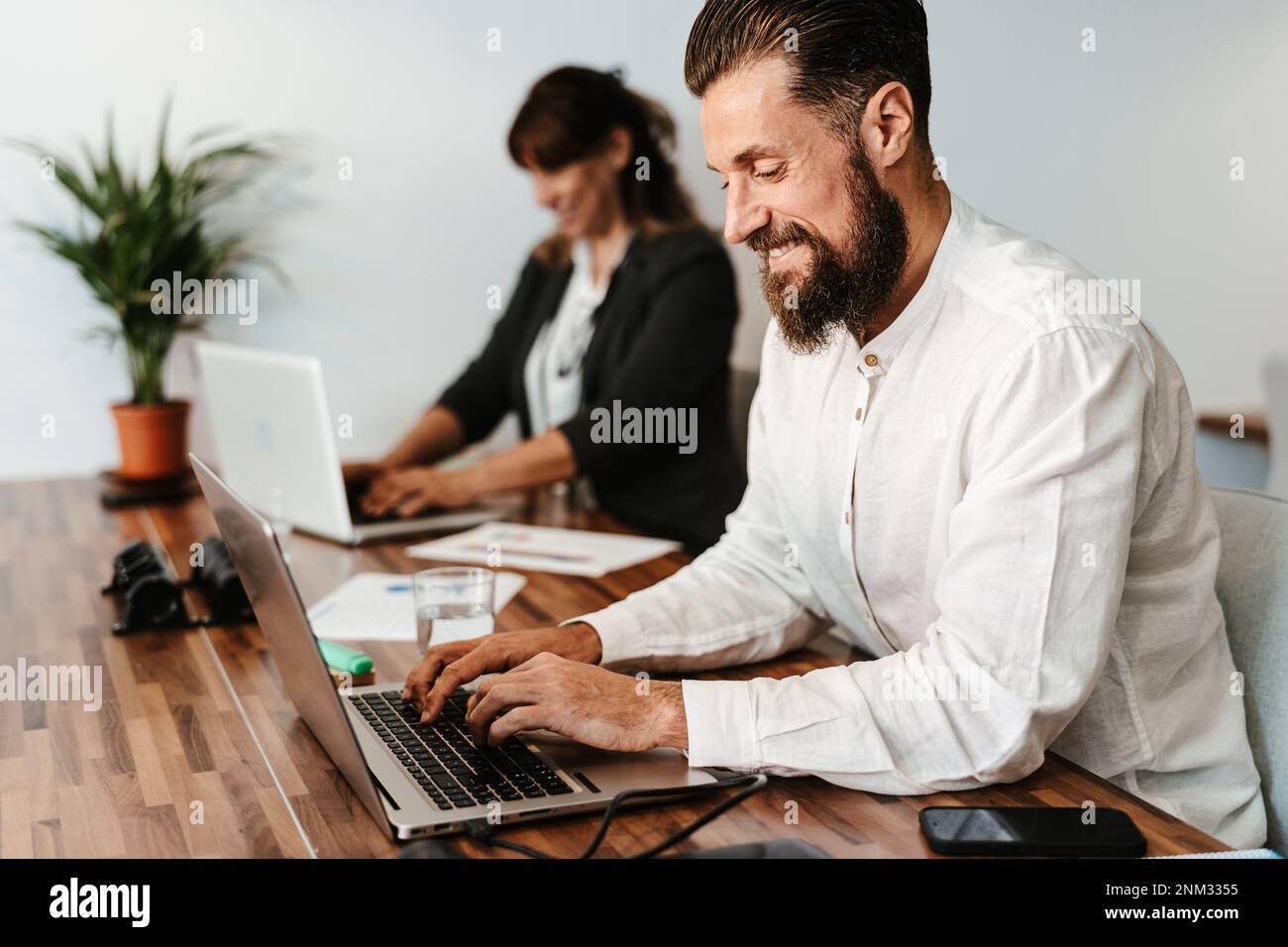 Multiracial people working inside coworking creative space Stock Photo ...