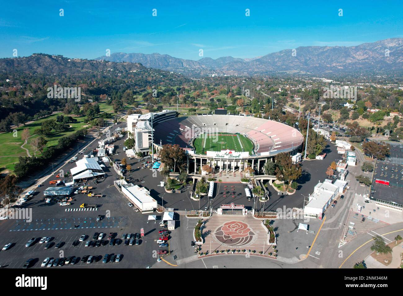An aerial view of the Rose Bowl Stadium football field with the logos ...