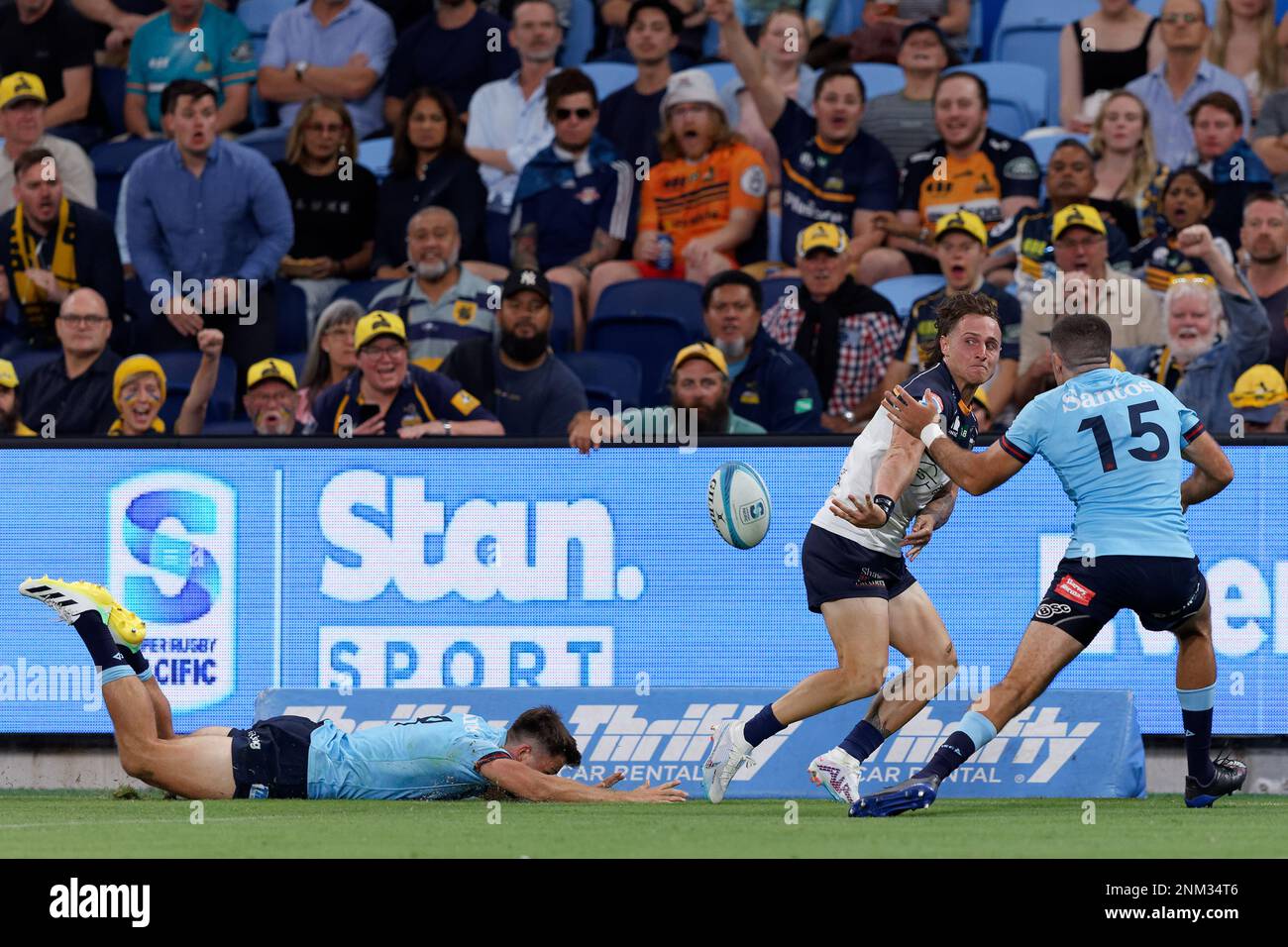 Corey Toole of the Brumbies flicks the ball during the Super Rugby ...
