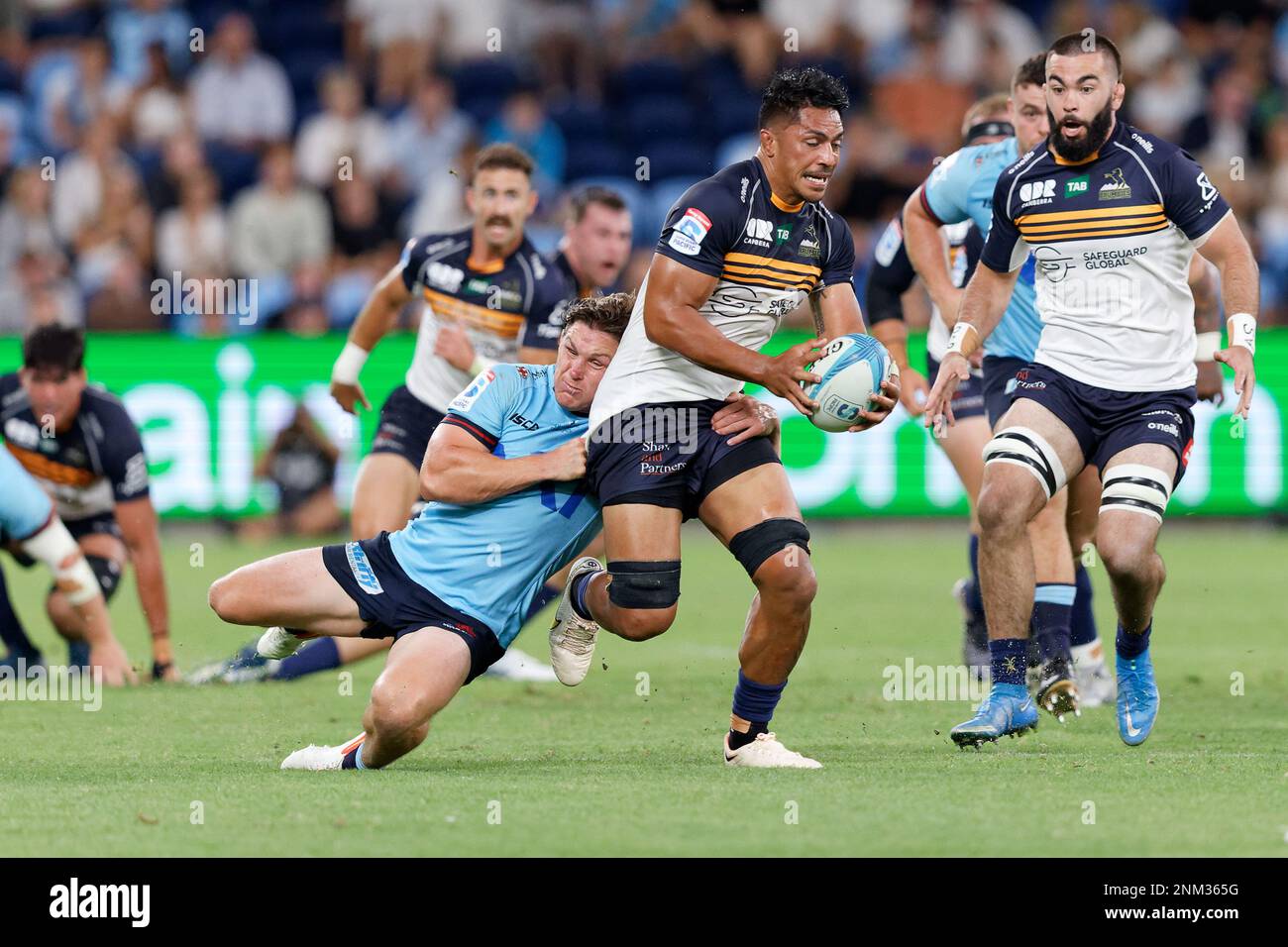 Pete Samu of the Brumbies is tackled during the Super Rugby Pacific ...
