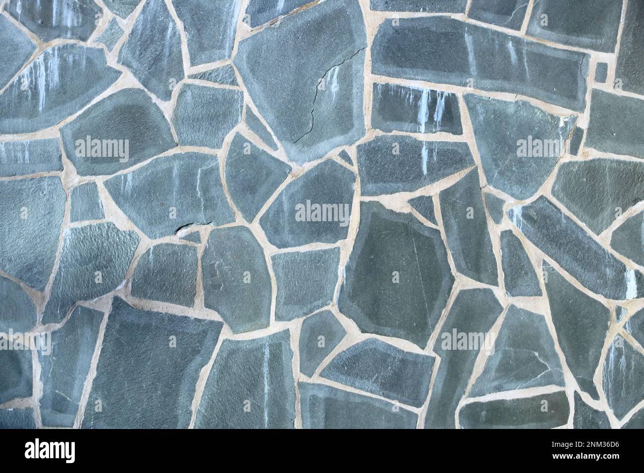 a olive green stone slabs wall Stock Photo - Alamy