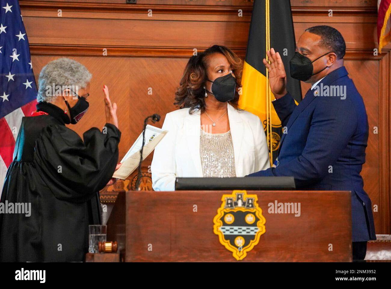 Judge Kim Berkeley-Clark, left, swears in Ed Gainey, right, as the 61st ...