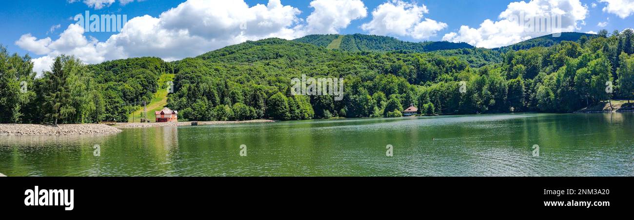Bodi lake in Maramures, Romania - Panoramic view. Summer landscape ...