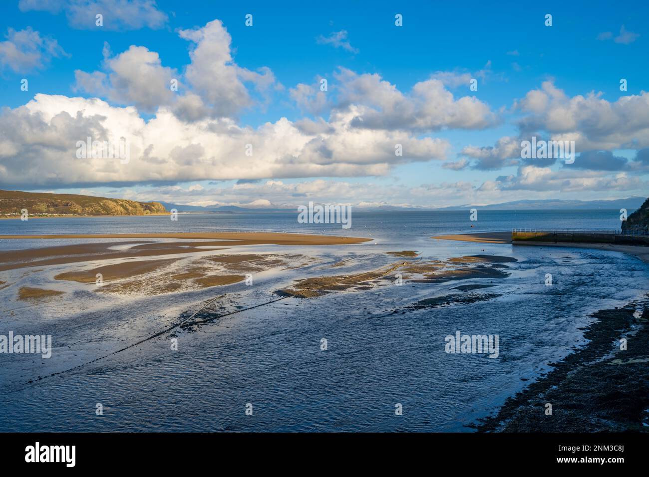 Looking out across the sea to the hills of Snowdonia from Abersoch on ...