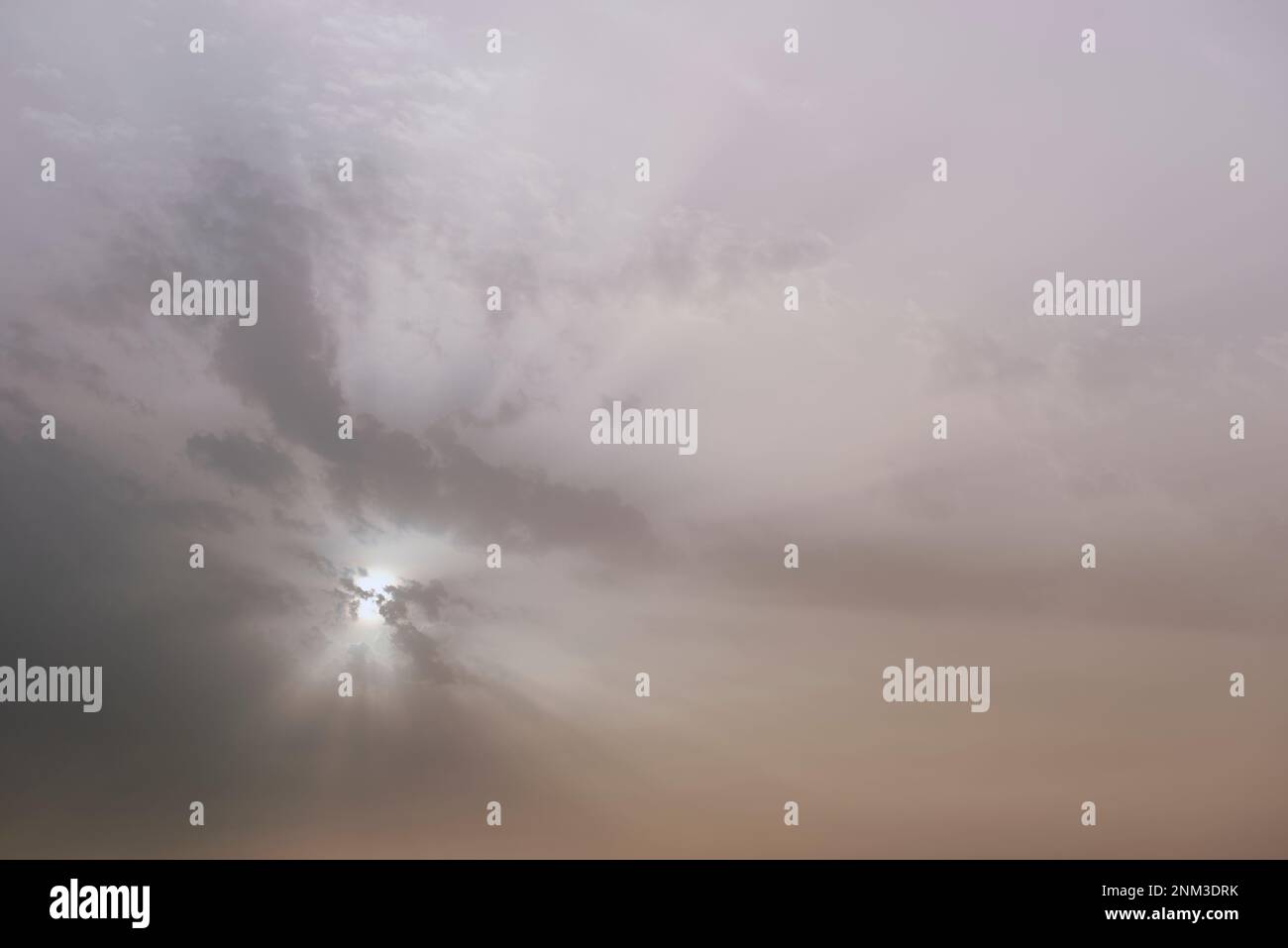 Sky, with diffused sun clouds colourful Stock Photo - Alamy