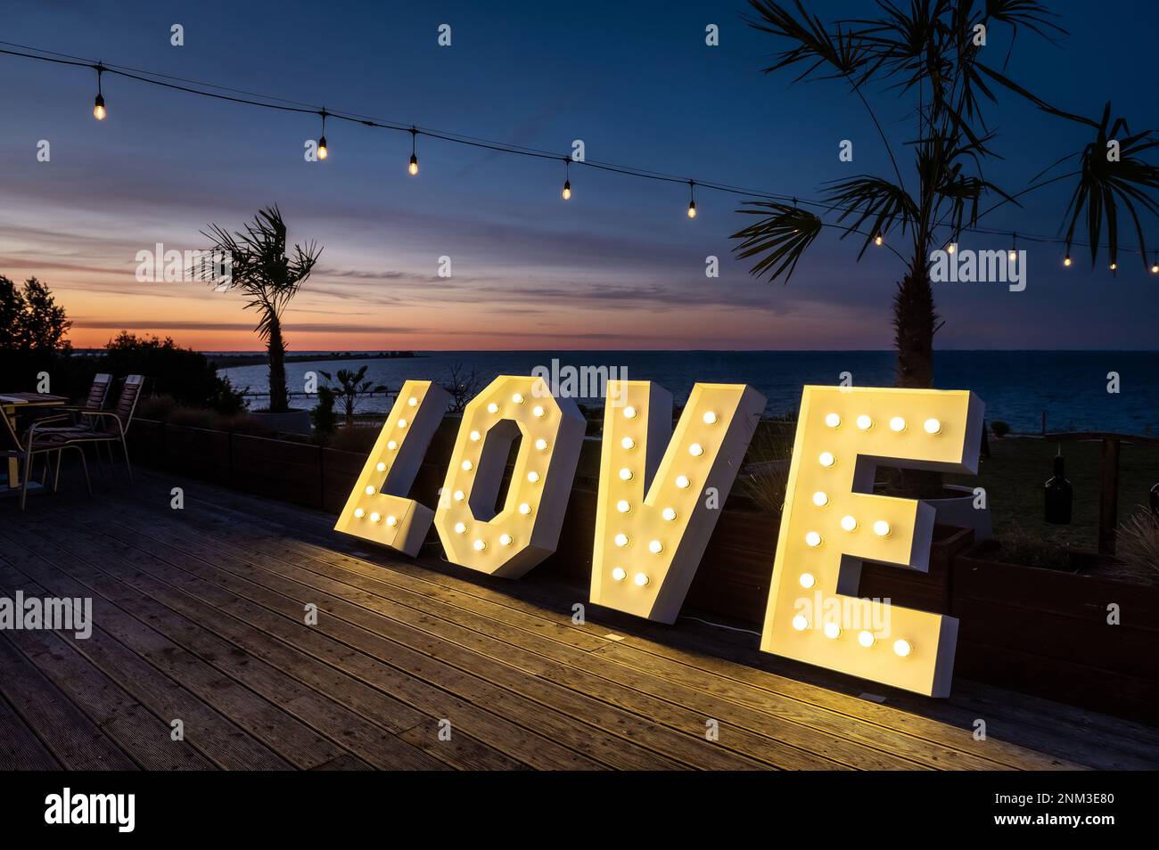 wedding hall interiors and decorations illuminated love inscription ...