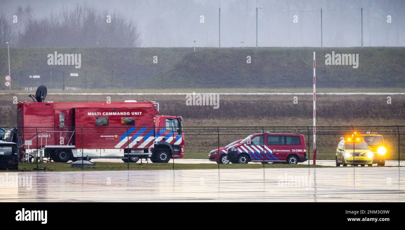 EINDHOVEN - Emergency services at a Transavia plane at Eindhoven ...