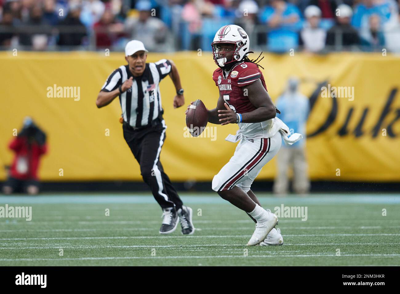 South Carolina Gamecocks quarterback Dakereon Joyner (5) scrambles out ...