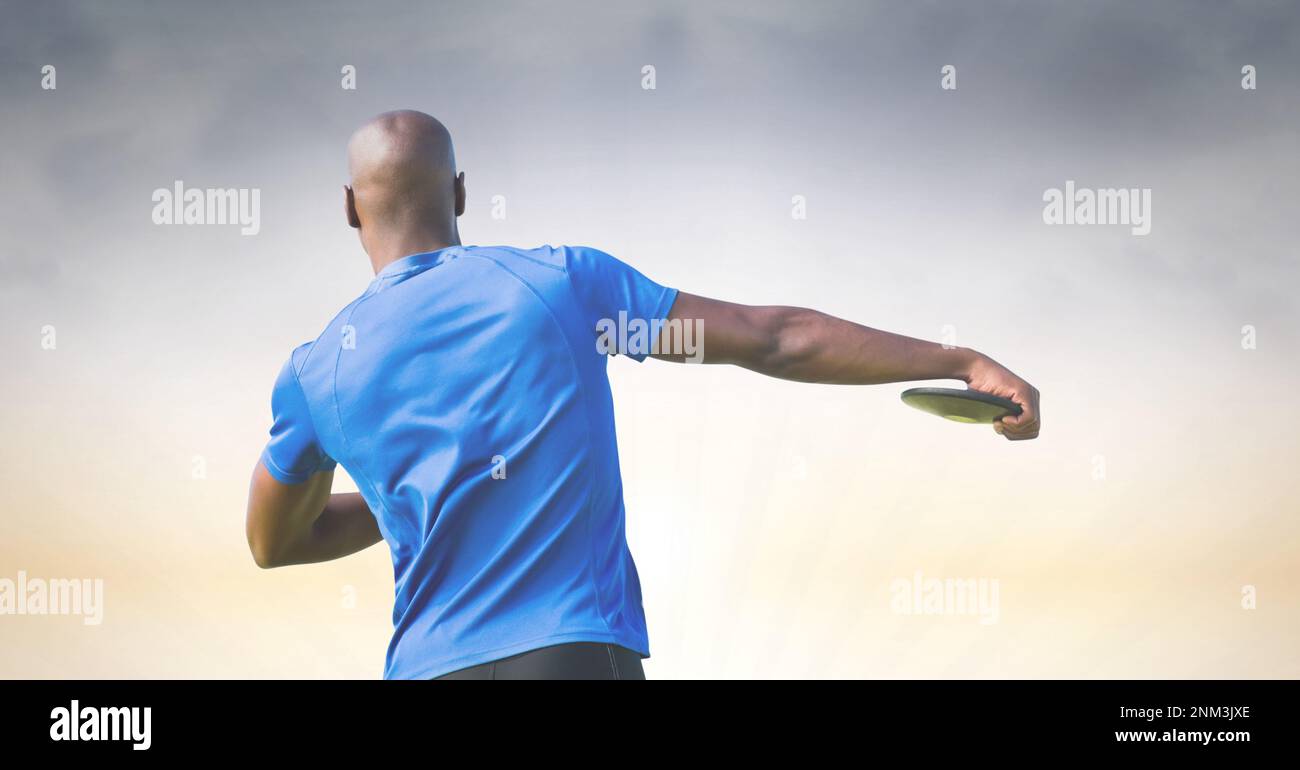 Composition of rear view of african american male athlete throwing ...