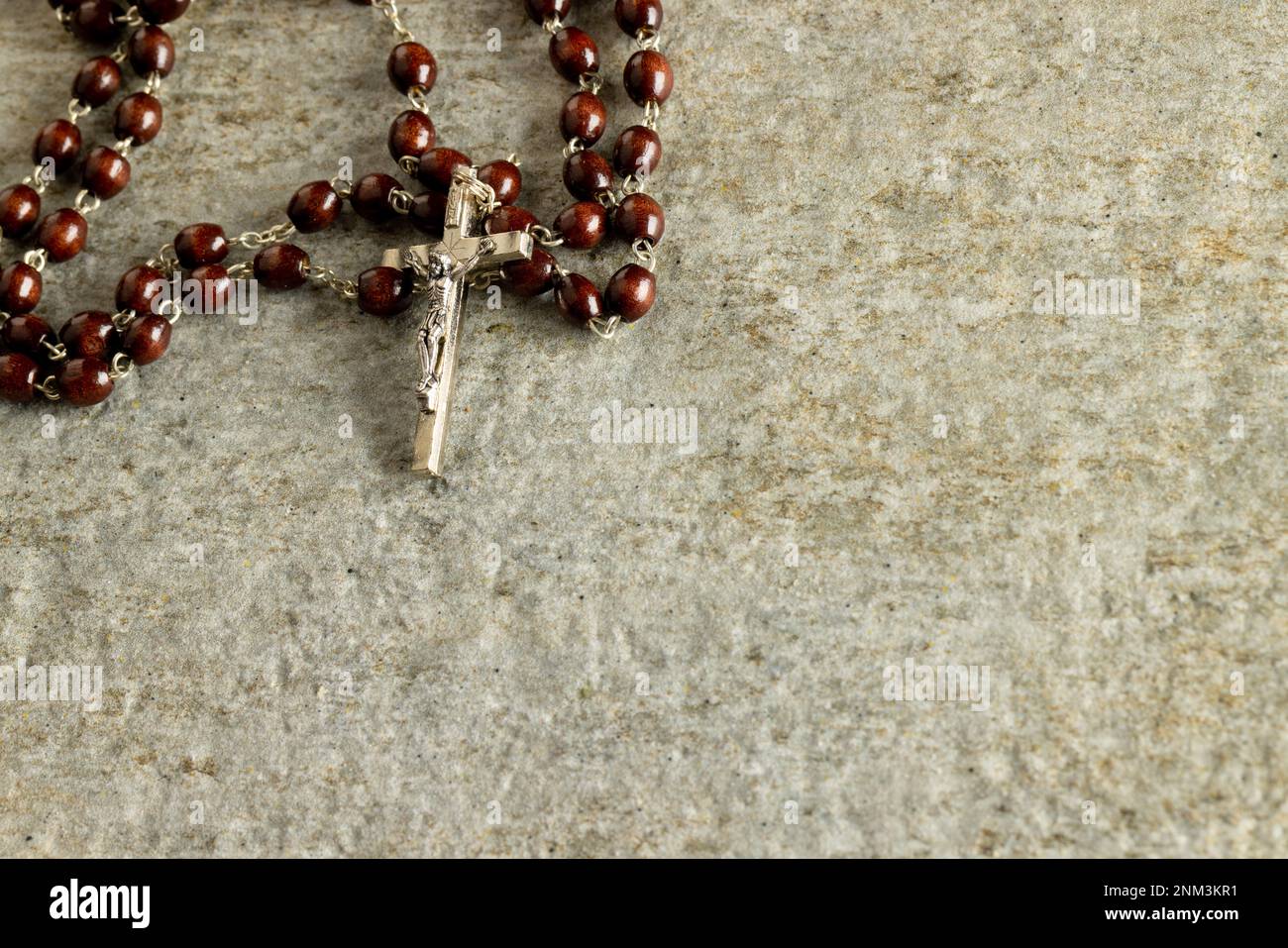 Image of close up of rosary and copy space on stone background Stock ...