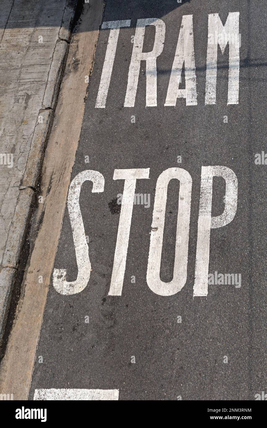 White Letters Tram Stop Street Sign in Hong Kong Stock Photo - Alamy