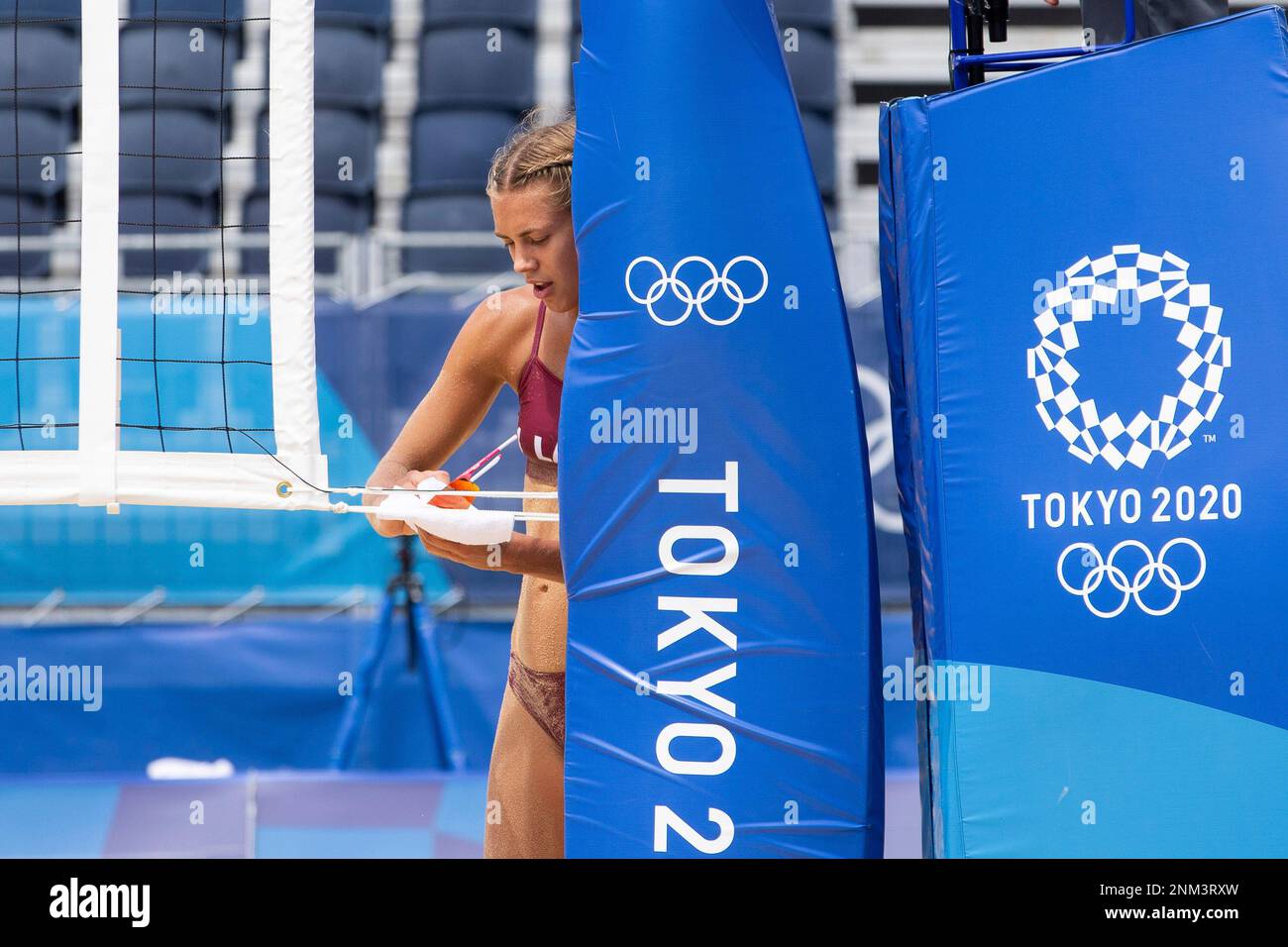 July 31, 2021: Tina Graudina (1) of Latvia cleans her sunglasses during ...